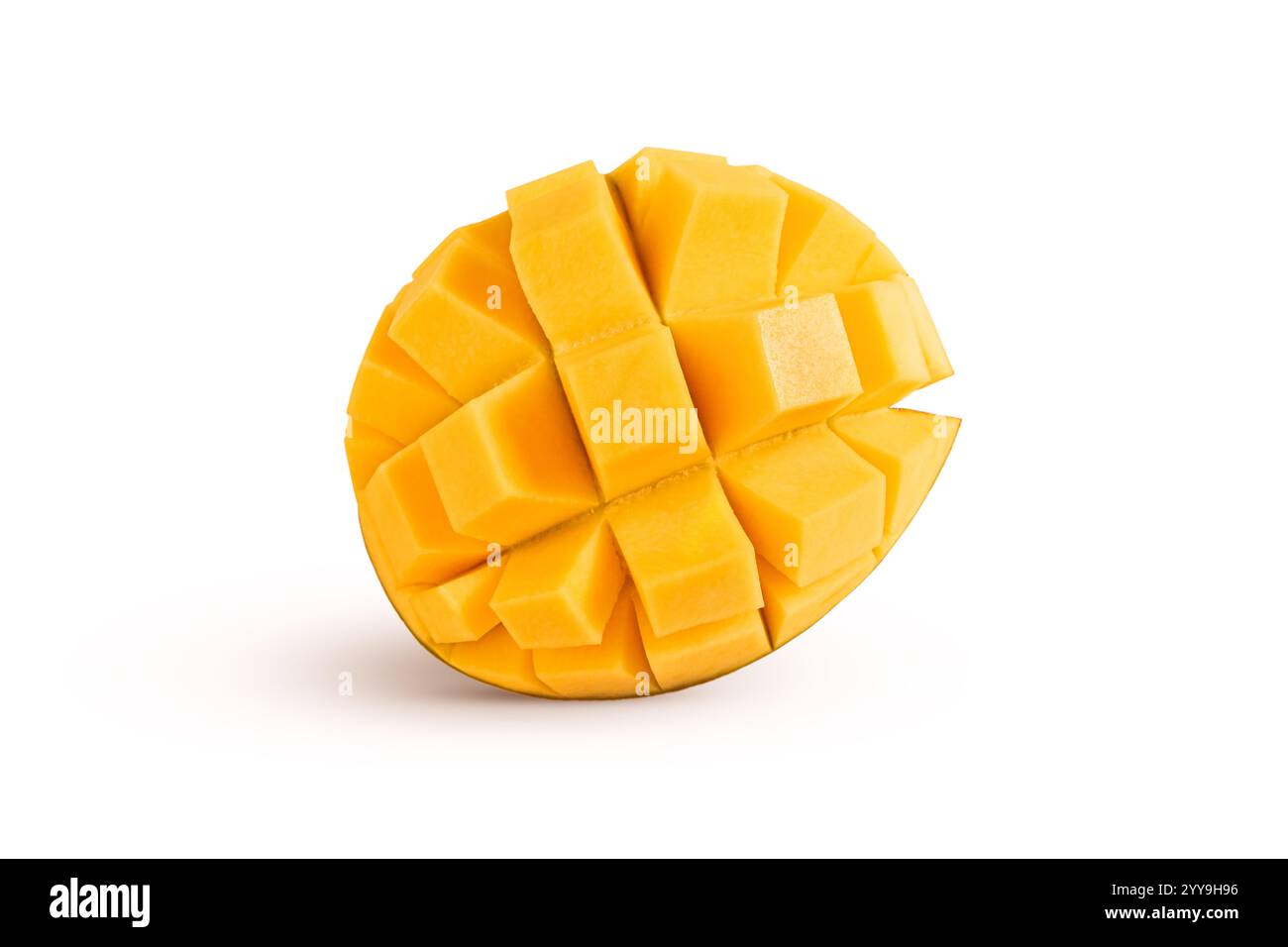 Fresh mango cubes half isolated on white background Stock Photo - Alamy