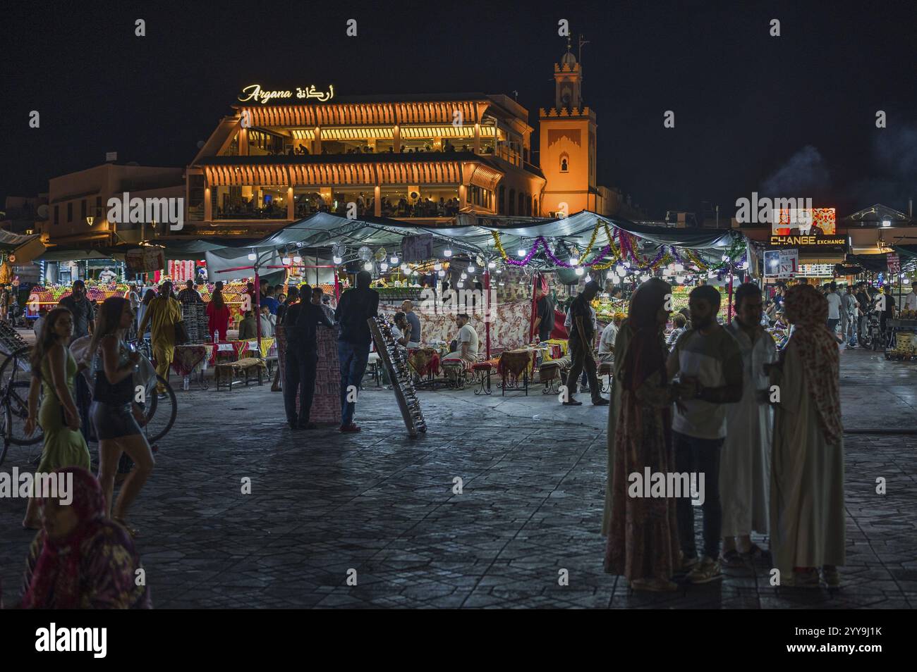 MARRAKESH, MOROCCO - SEPTEMBER 29, 2024: People in the square Jemaa el ...