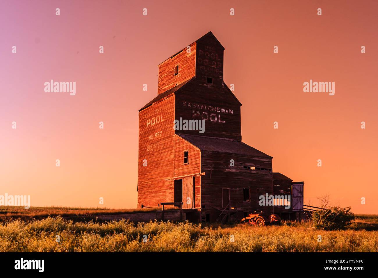 An old grain silo with a sign on it that says "Pool". The silo is ...