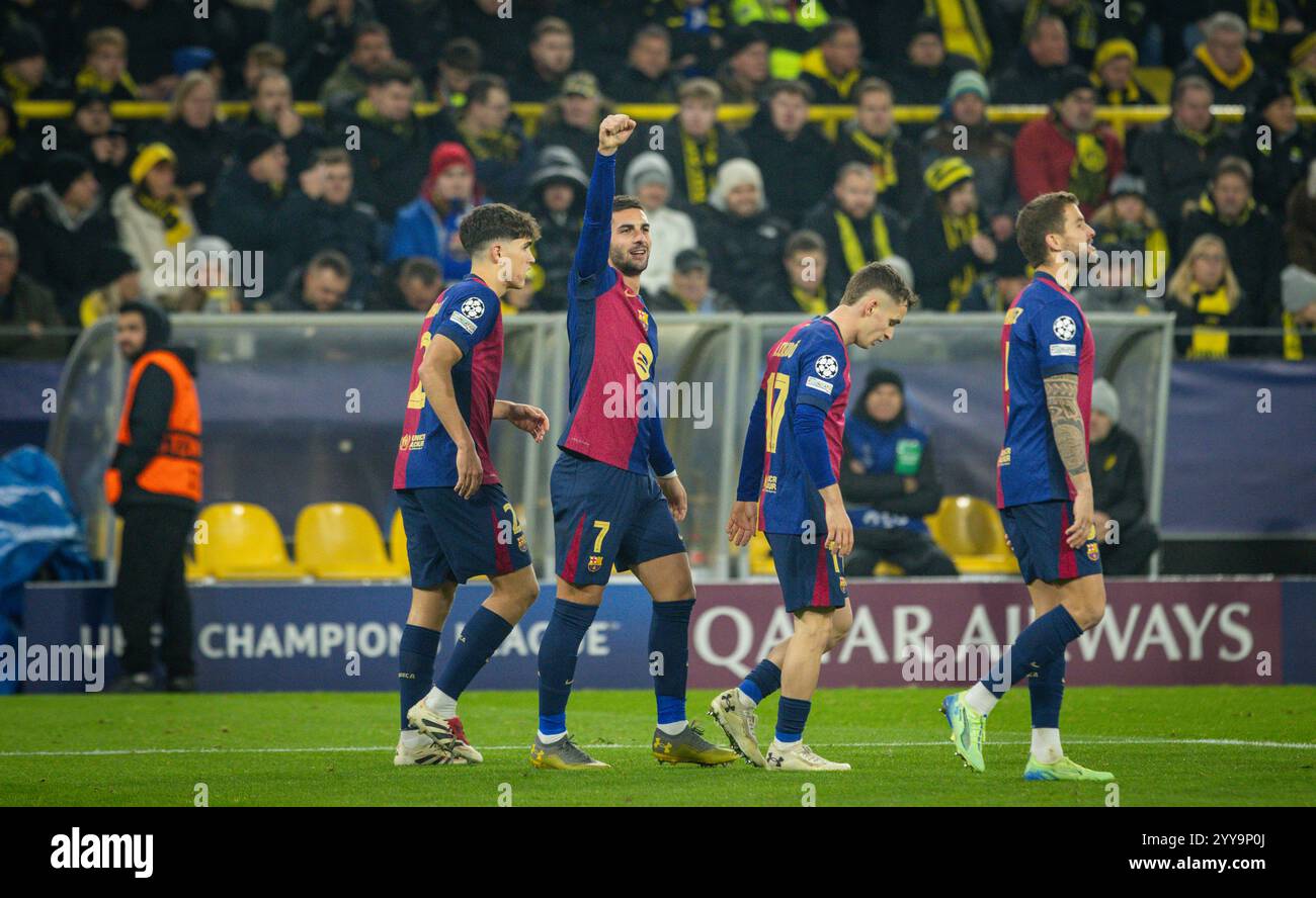 Dortmund, Germany. 11th Dec 2024. Pau Cubarsi (Barca) Ferran Torres ...