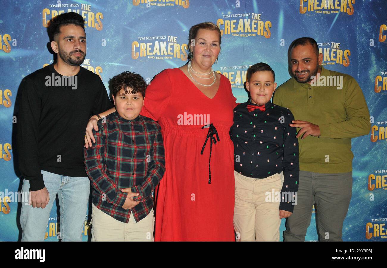 London, UK. 19th Dec, 2024. Nelly Ghaffar (in red dress) and family at ...