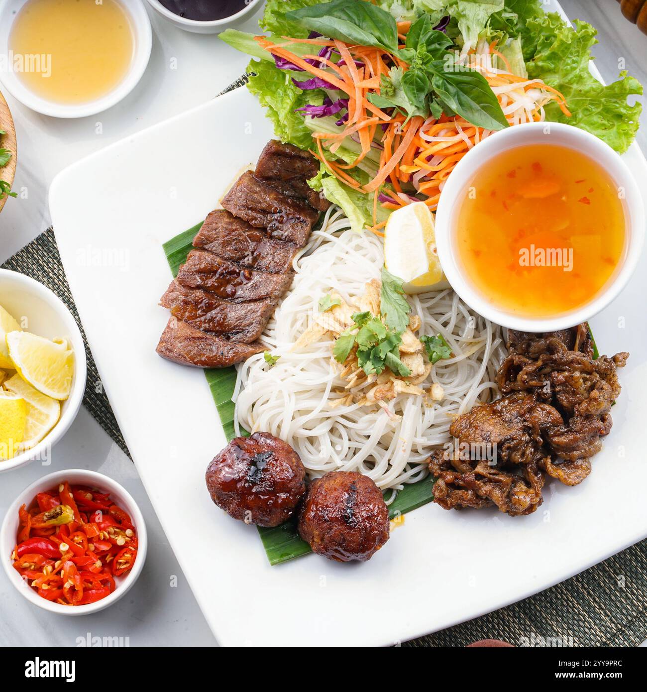 Grilled Chinese-style char siu pork served over steamed white rice with ...