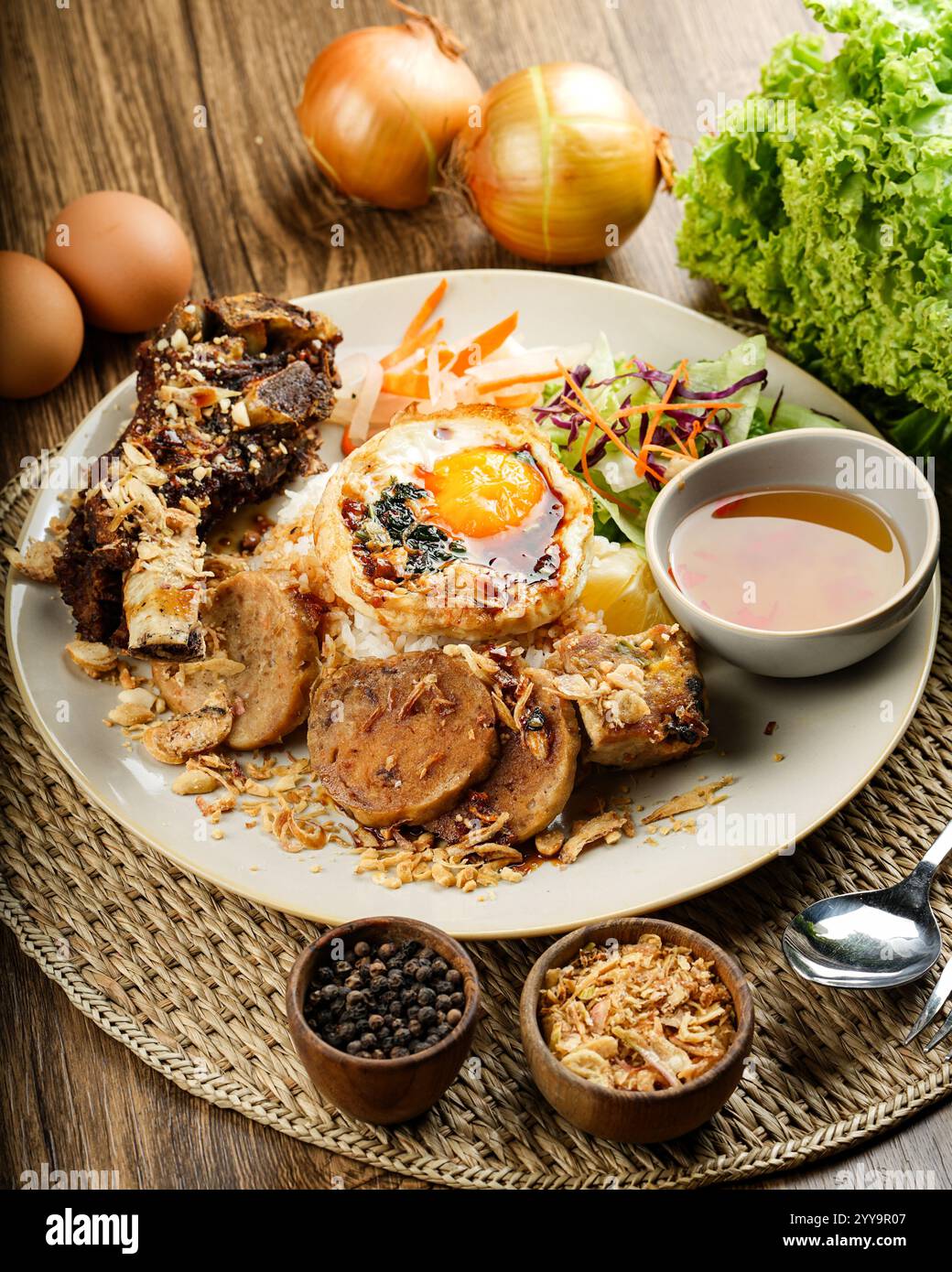 Traditional Vietnamese Cơm Tấm (broken rice) dish served with grilled ...