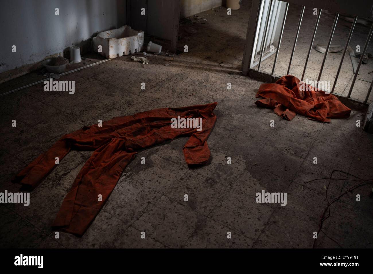 Clothes lie on the ground of a corridor of cells in the infamous ...