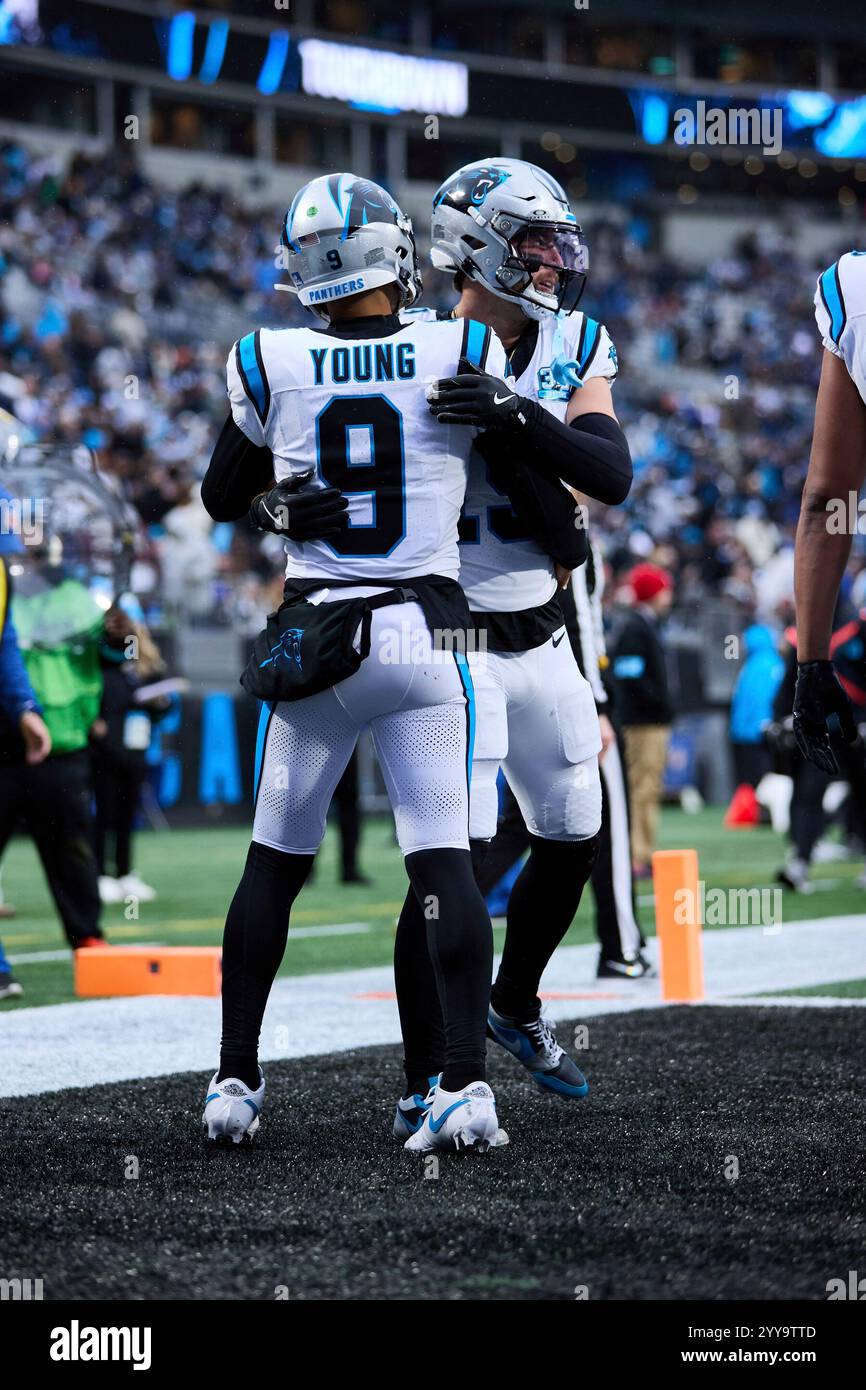 Carolina Panthers quarterback Bryce Young (9) gets a hug from teammate ...