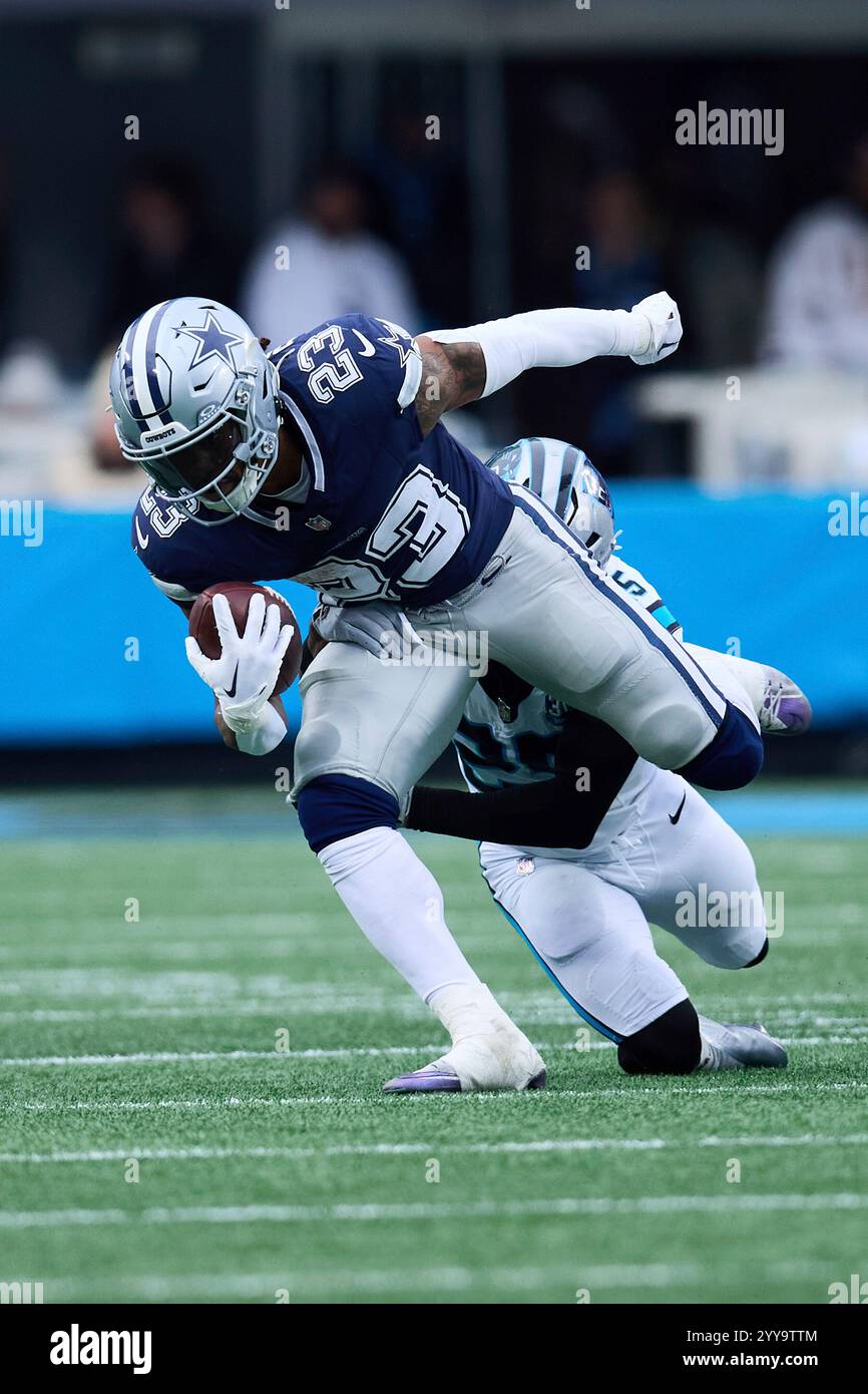 Dallas Cowboys running back Rico Dowdle (23) tries to run through the ...