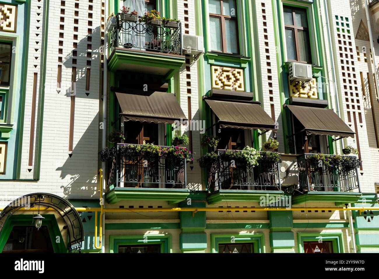 Decorative Green Balcony Facades in Urban Setting. Balcony awning from ...