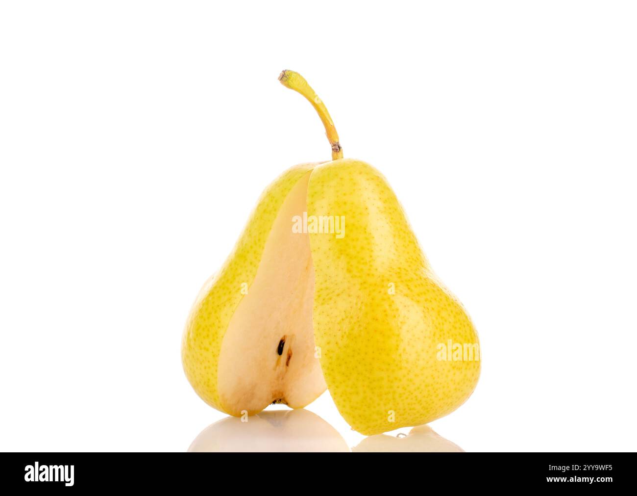 One cut yellow ripe pear, close-up, isolated on white background Stock ...