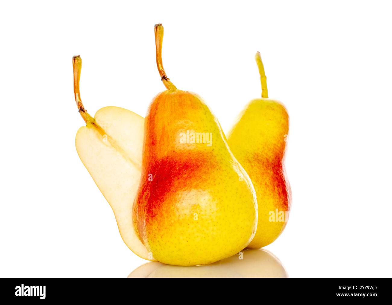 One cut yellow ripe pear, close-up, isolated on white background Stock ...
