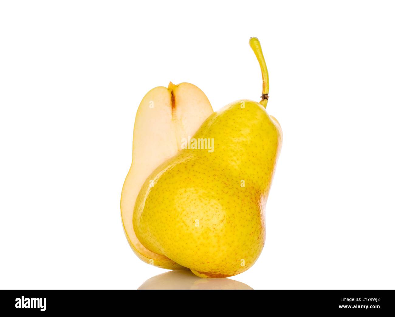 One cut yellow ripe pear, close-up, isolated on white background Stock ...