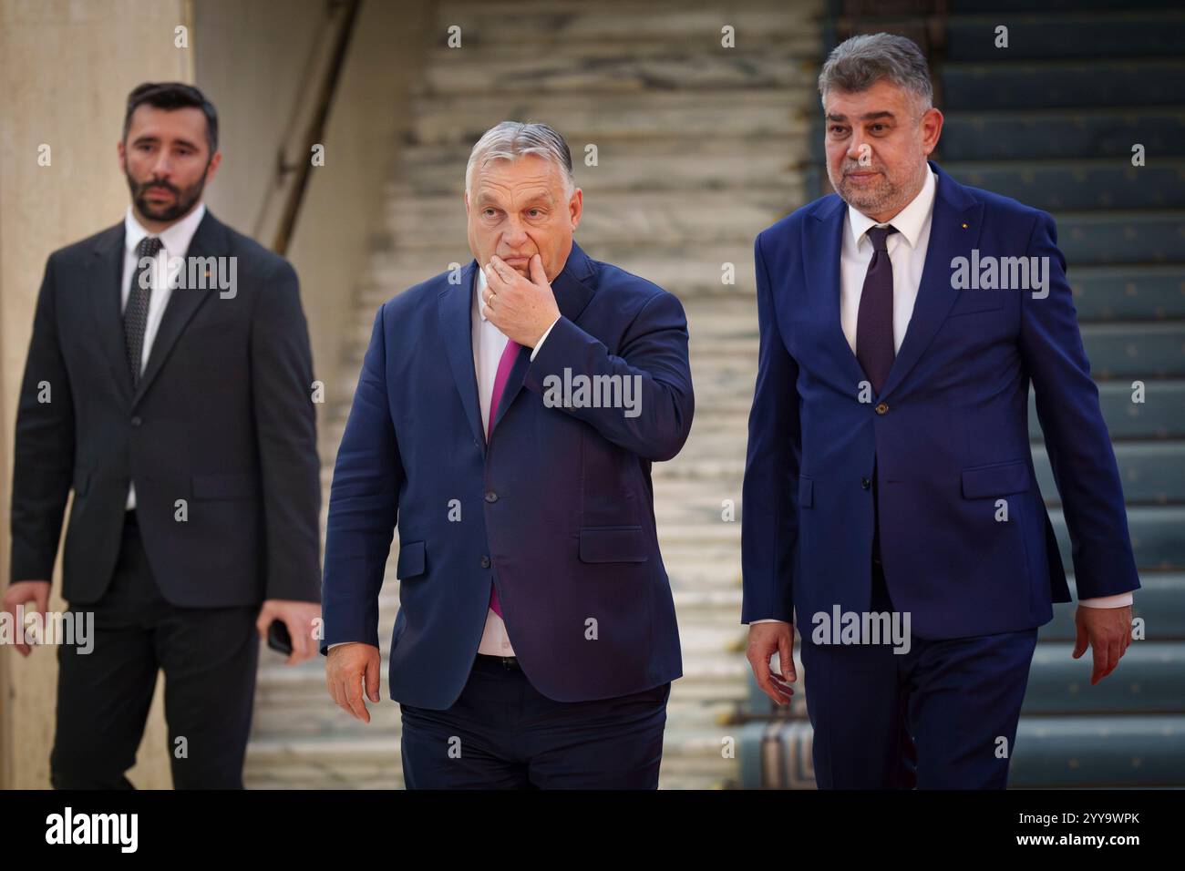 Hungarian Prime Minister Viktor Orban, centre, walks with Romanian ...