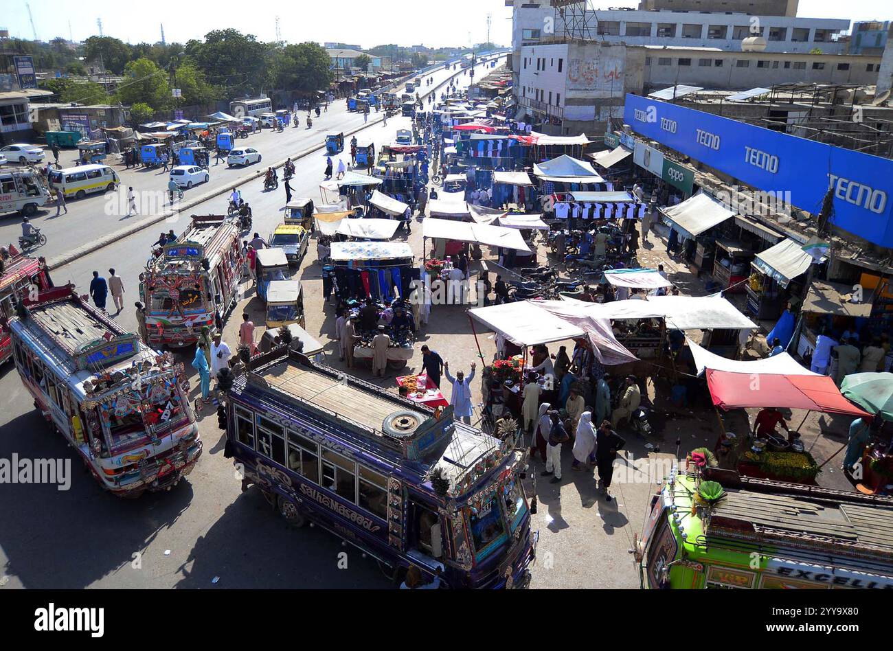 View of illegal encroachment by pushcart vendors on a road by influent ...