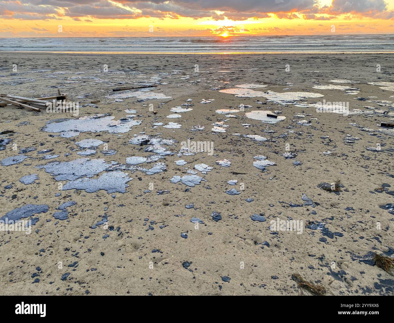 Beach pollution oil contamination environmental hi-res stock ...