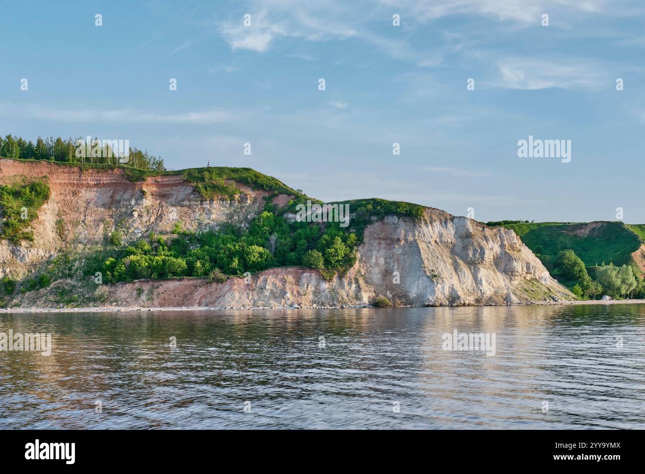 Picturesque landscape featuring steep, rocky cliffs covered with ...
