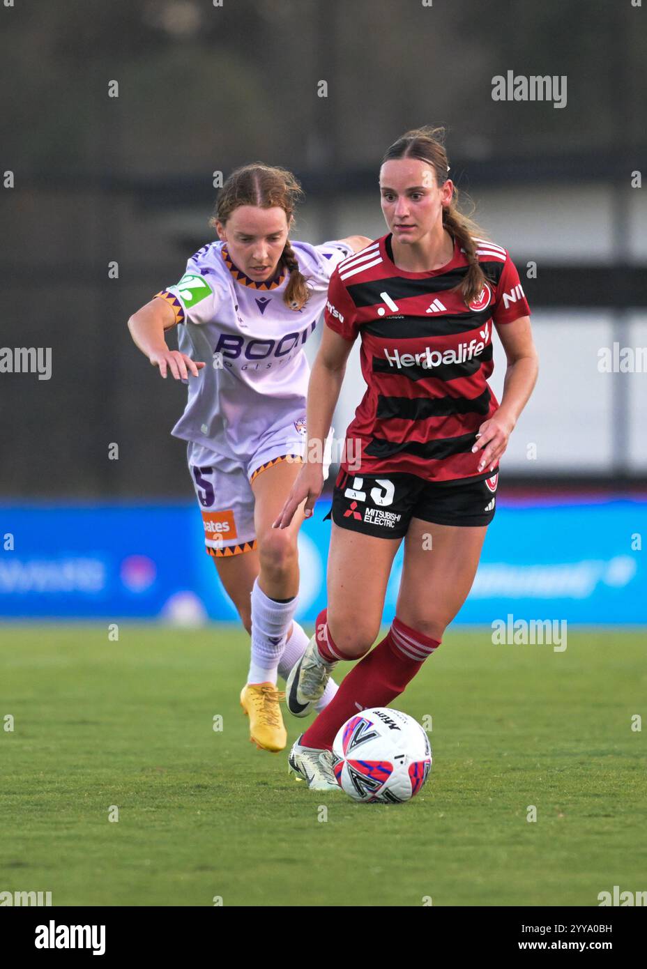 Rooty Hills, Australia. 20th Dec, 2024. Grace Johnston (L) of Perth ...