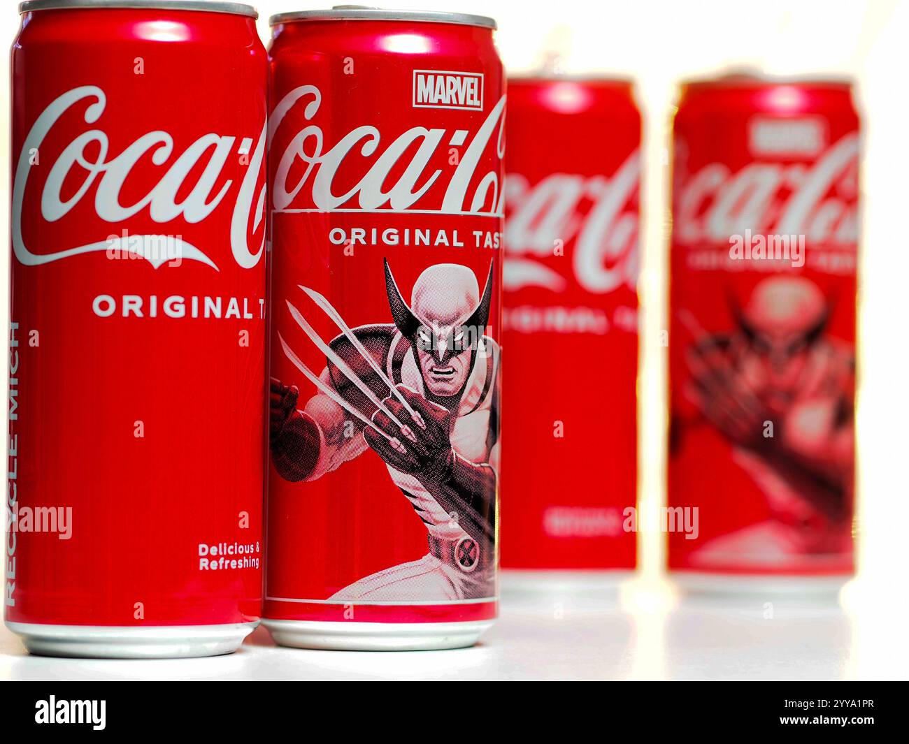 Germany. 20th Dec, 2024. In this photo illustration, cans of Coca-Cola ...