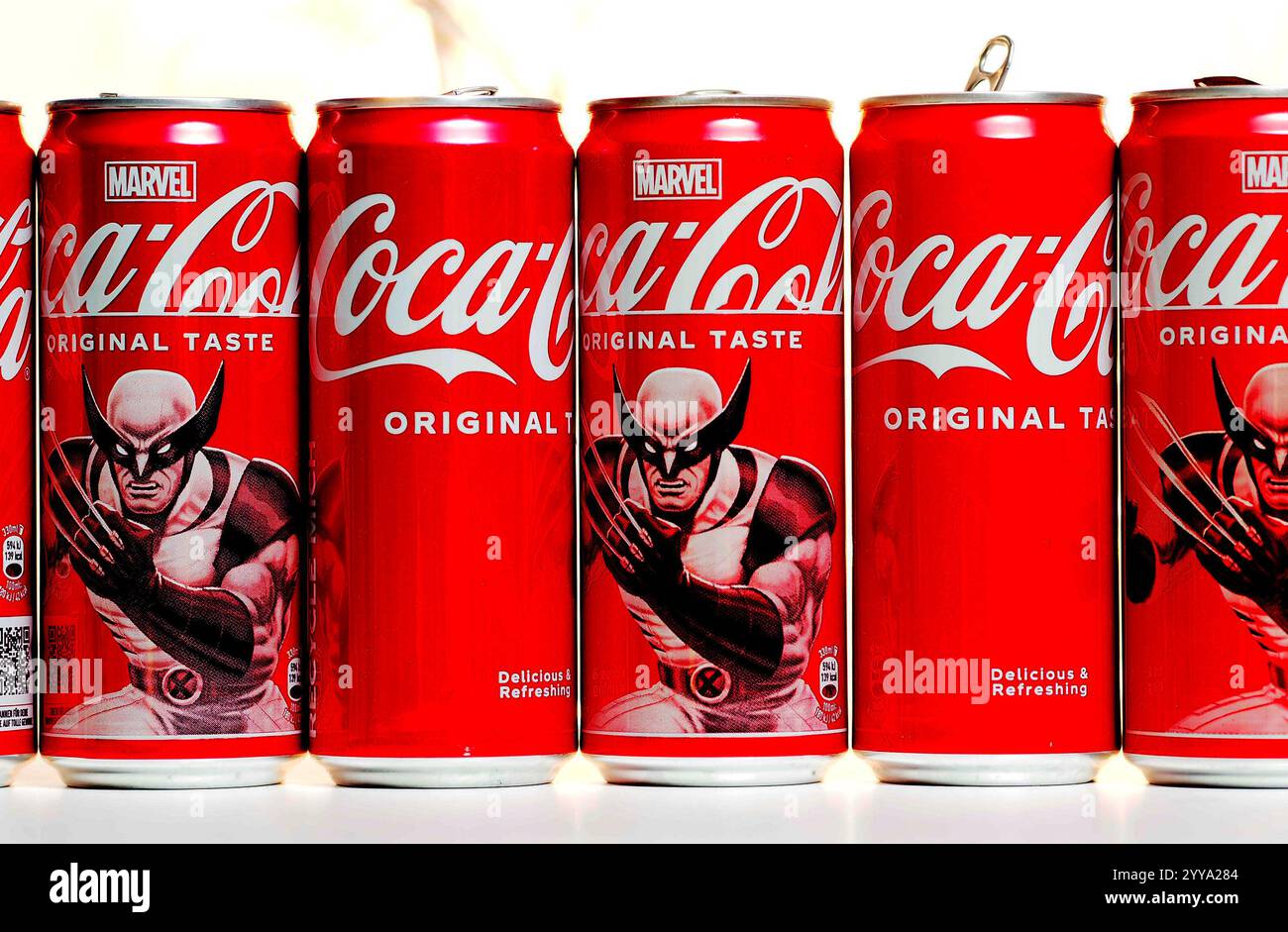 Germany. 20th Dec, 2024. In this photo illustration, cans of Coca-Cola ...