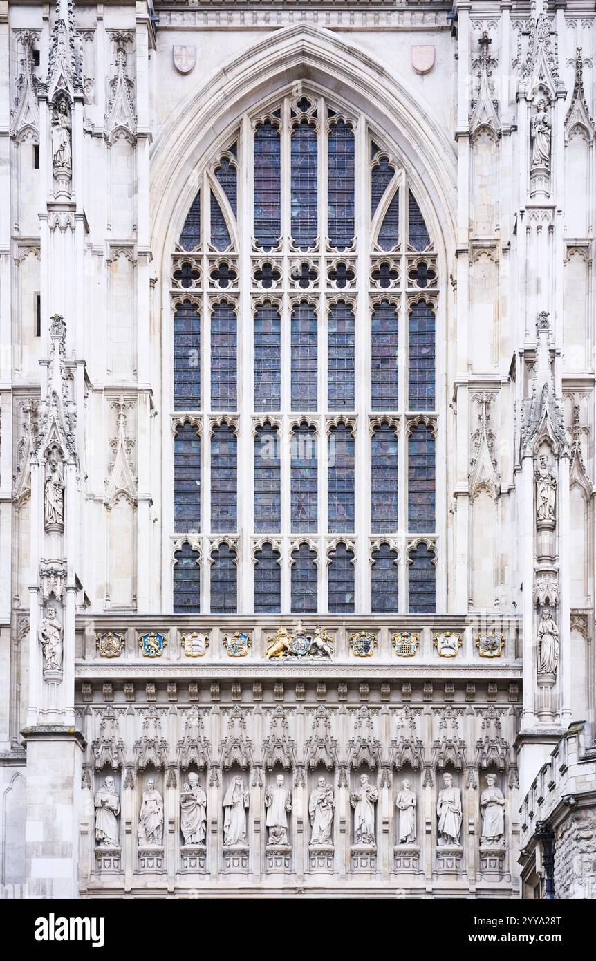 Pointed window, above statues of modern saints, at the west end of the ...
