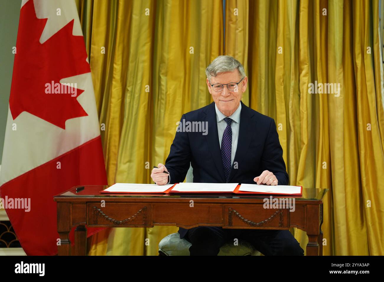 Ottawa, Canada. 20th Dec, 2024. Minister of Sport Terry Duguid signs a ...