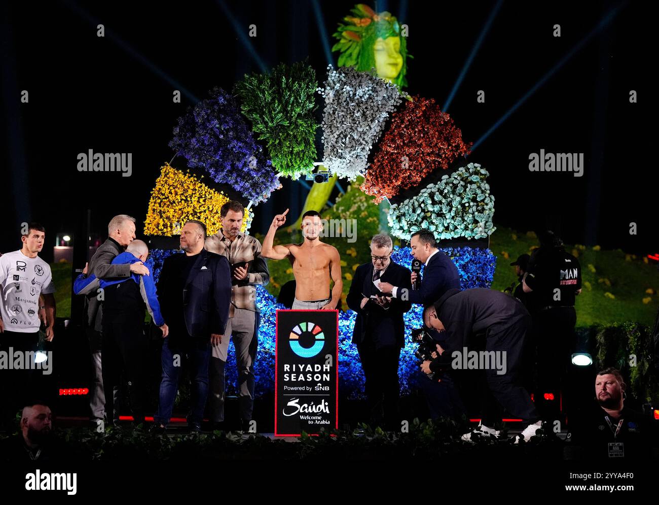 Rhys Edwards (centre) during a weigh-in in Riyadh. Tyson Fury and ...