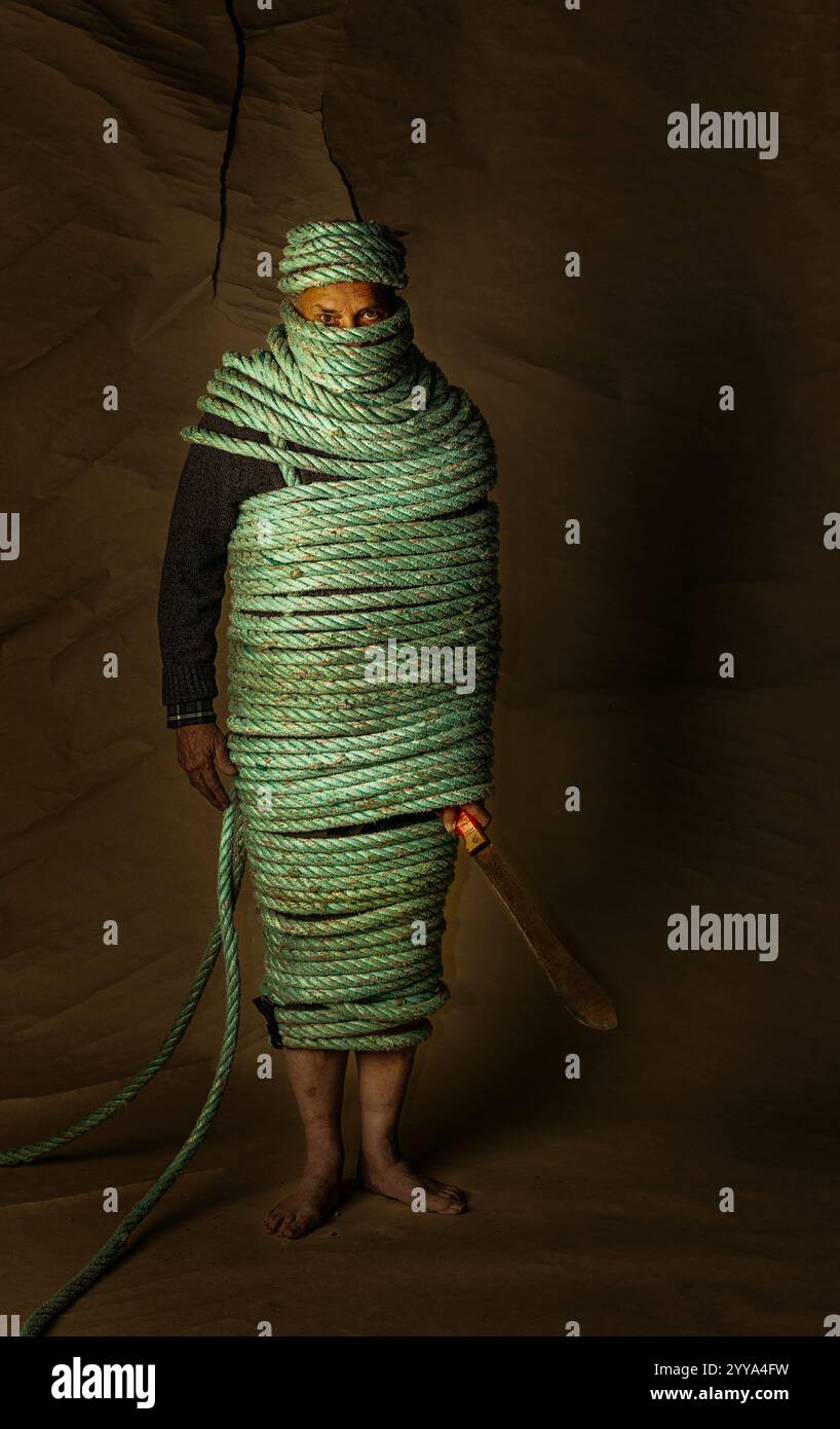 Man tied up hi-res stock photography and images - Alamy