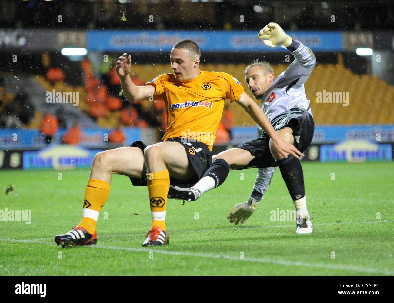 James Spray of Wolverhampton Wanderers and goalkeeper Steve Mildenhall ...