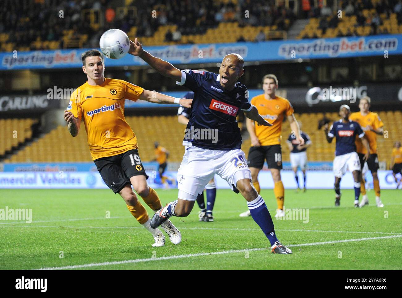 Jordan Stewart of Millwall appears to handle the ball in front of Adam ...