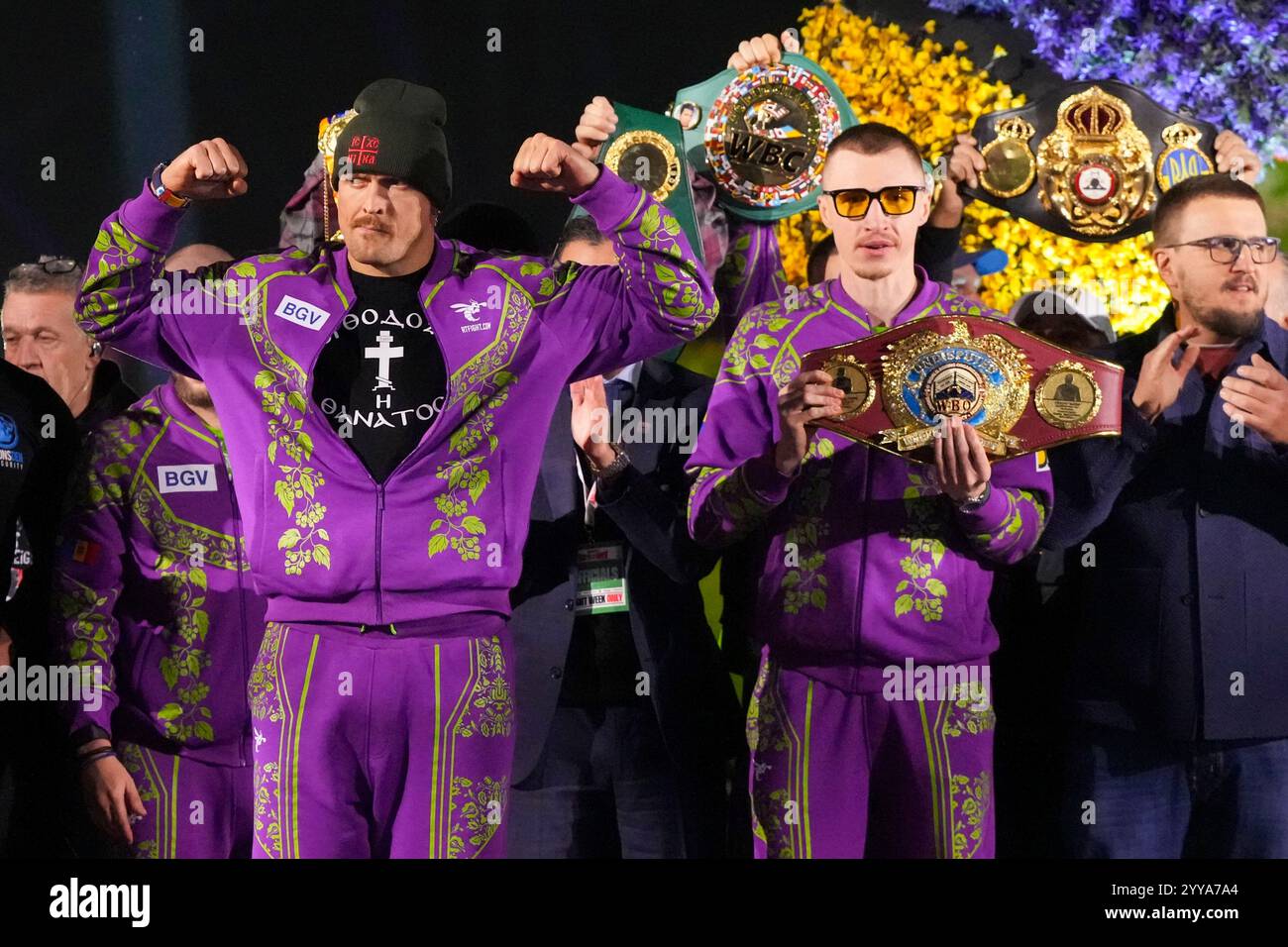 World Champion Ukraine's Oleksandr Usyk, left, arrives with his ...