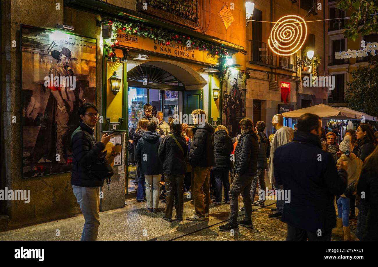 Crowded street at chocolate shop San Ginés, cafe, bar, famous for ...