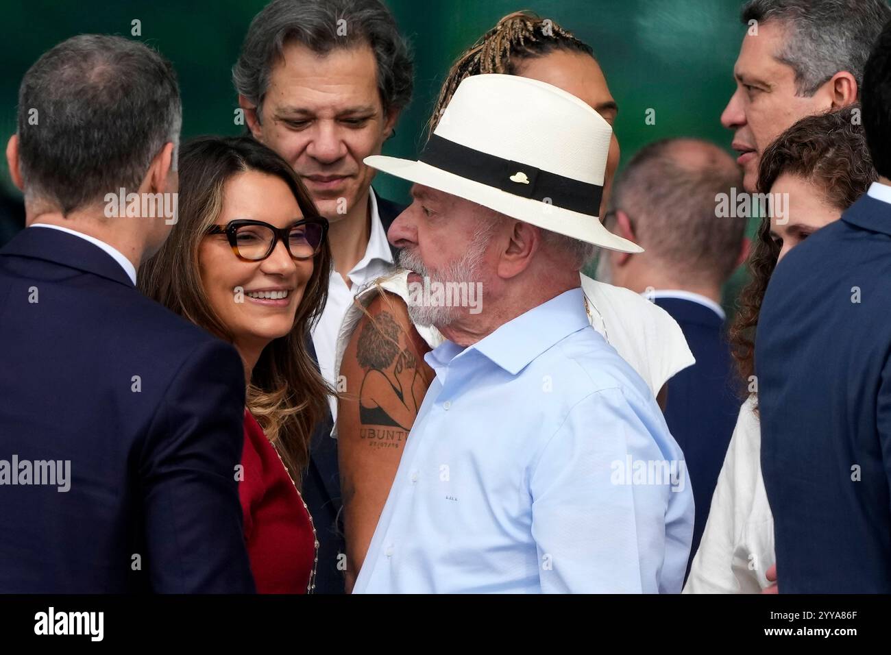 Brazilian President Luiz Inacio Lula da Silva, wearing hat, and first ...