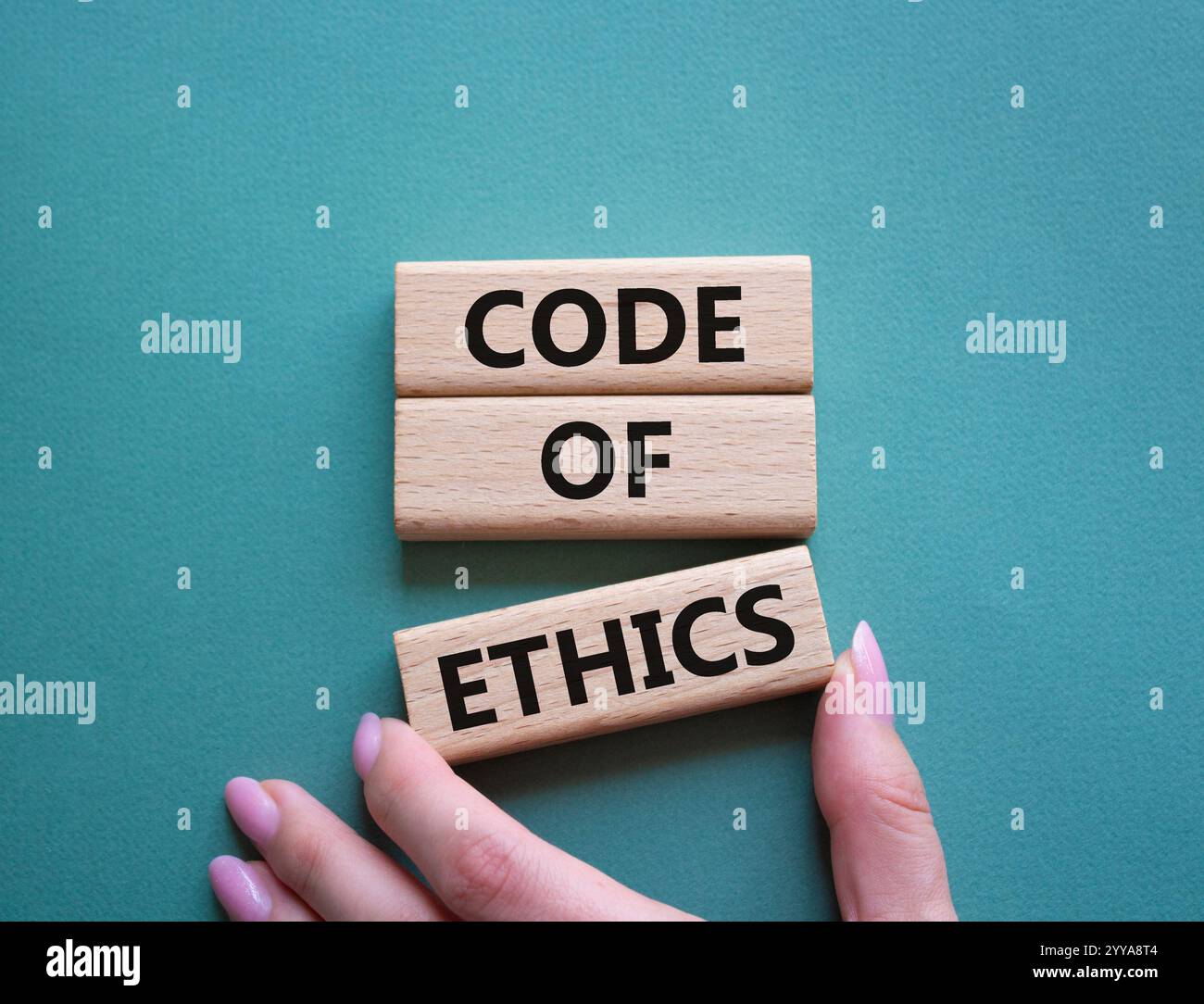 Code of ethics symbol. Concept words Code of ethics on wooden blocks ...