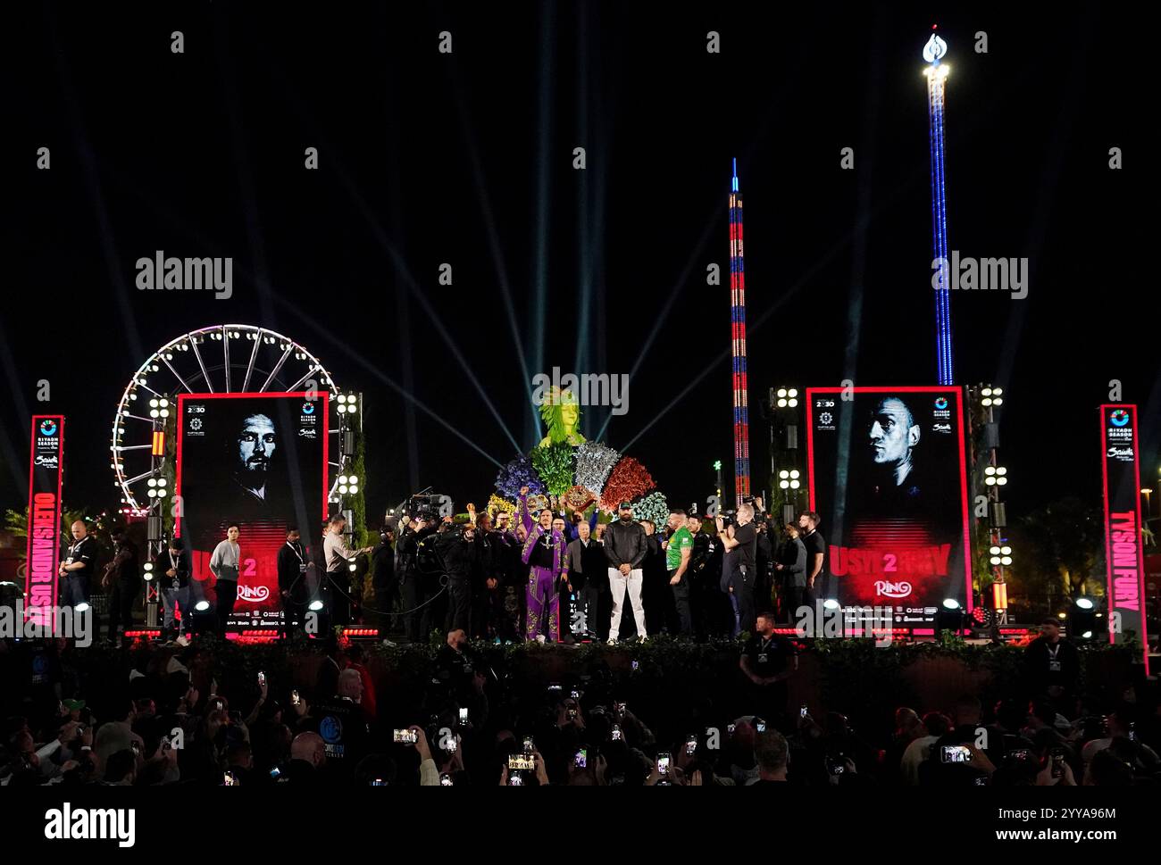 Oleksandr Usyk (centre left) and Tyson Fury (centre right) during a ...