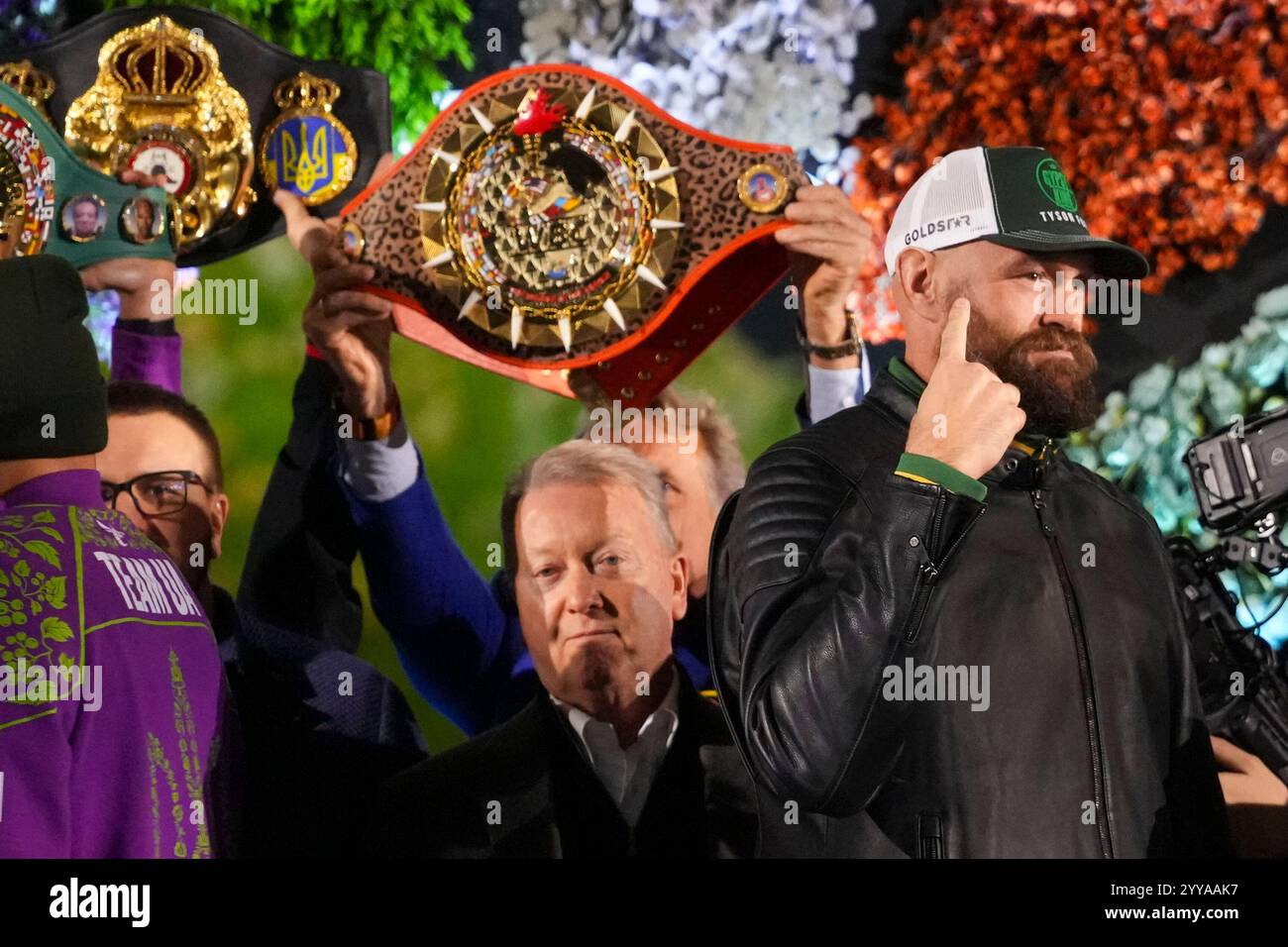 Britain's Tyson Fury gestures during the weigh-in of his WBA, WBO, and WBC heavyweight title ...