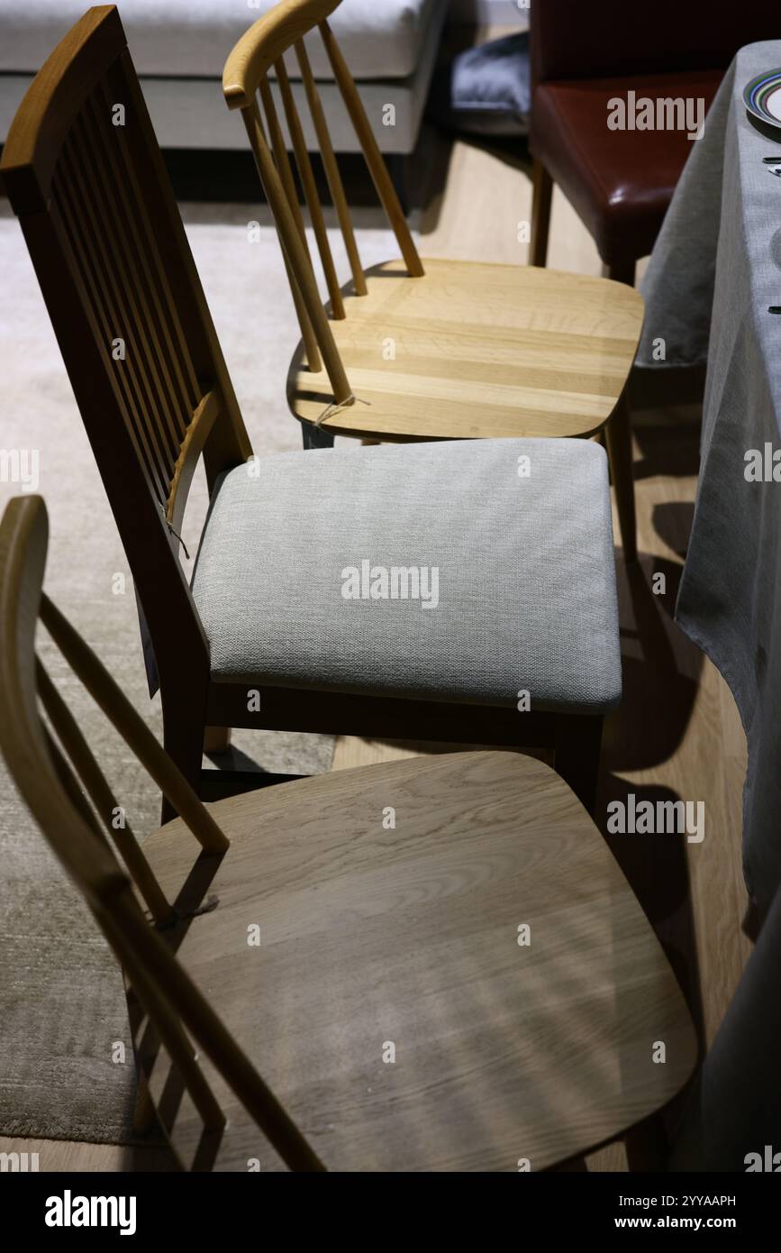 An eyecatching and striking arrangement of stacked chairs displays ...