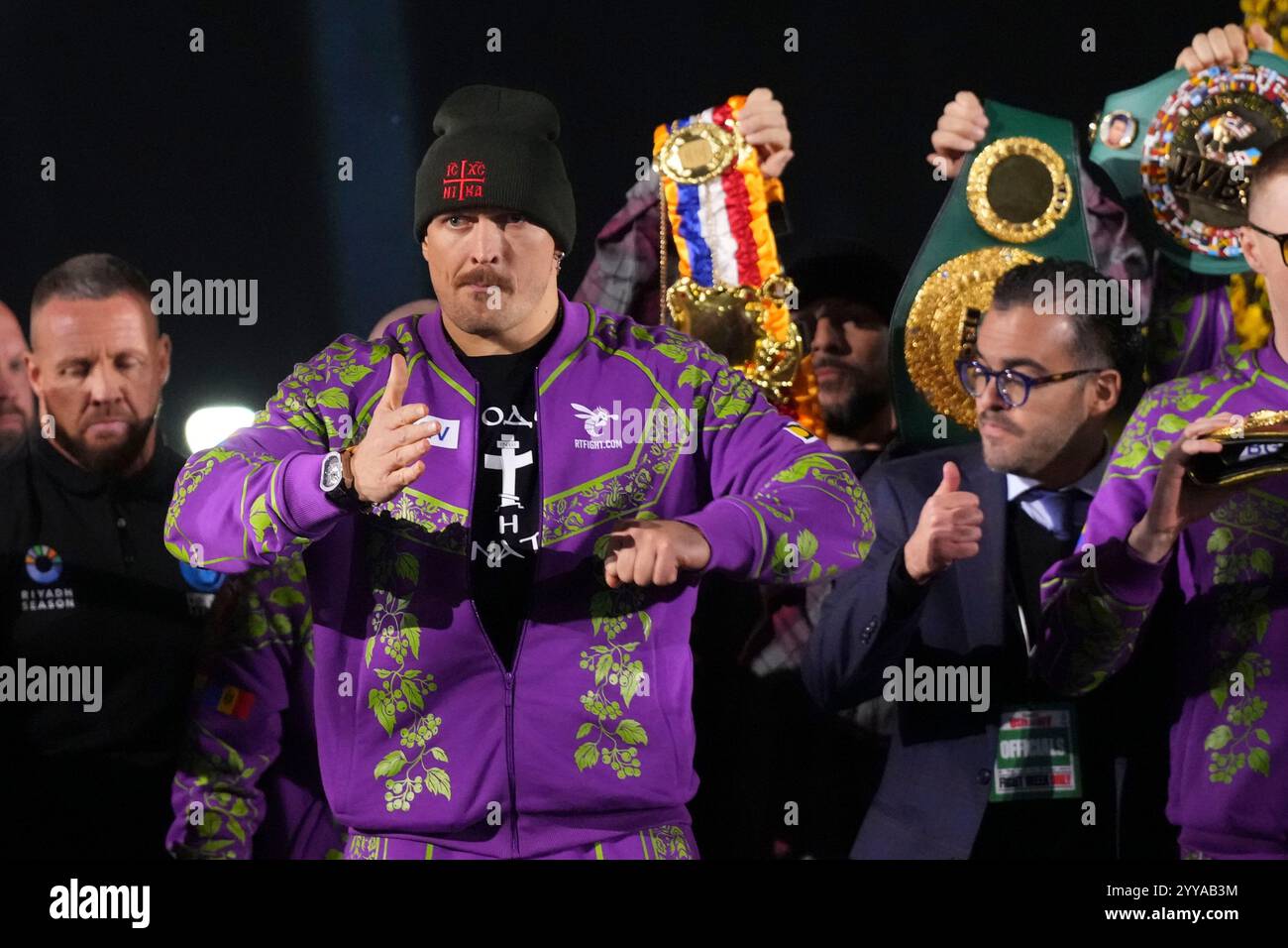 World Champion Ukraine's Oleksandr Usyk, left, arrives with his ...