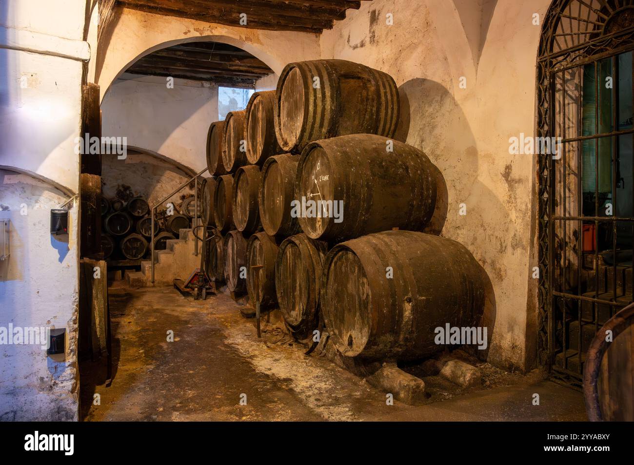 Solera systems in old Andalusian wine cellar, process for aging sherry ...