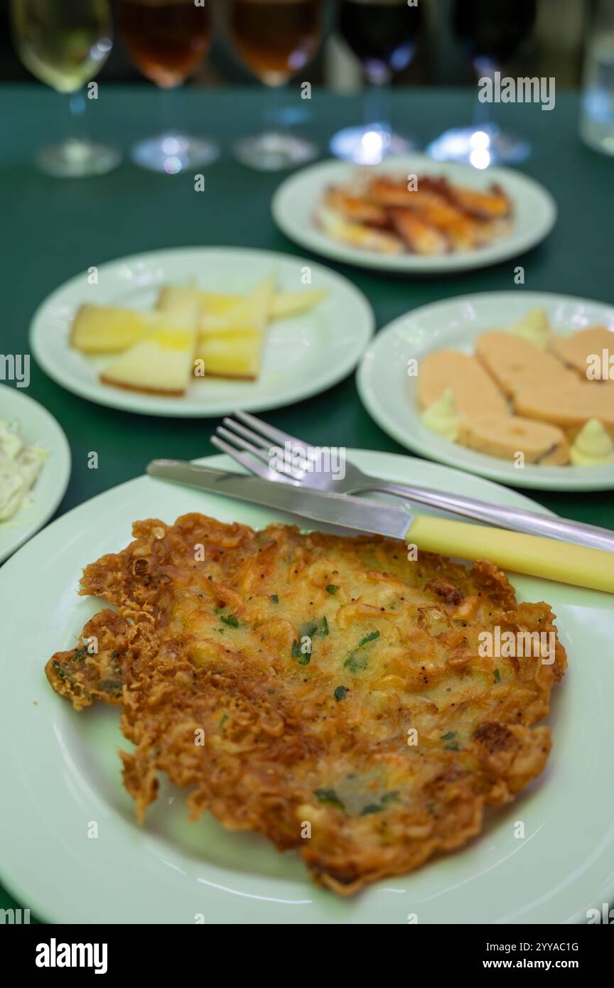 Traditional Andalusian dish from deep roasted potato and seafood ...