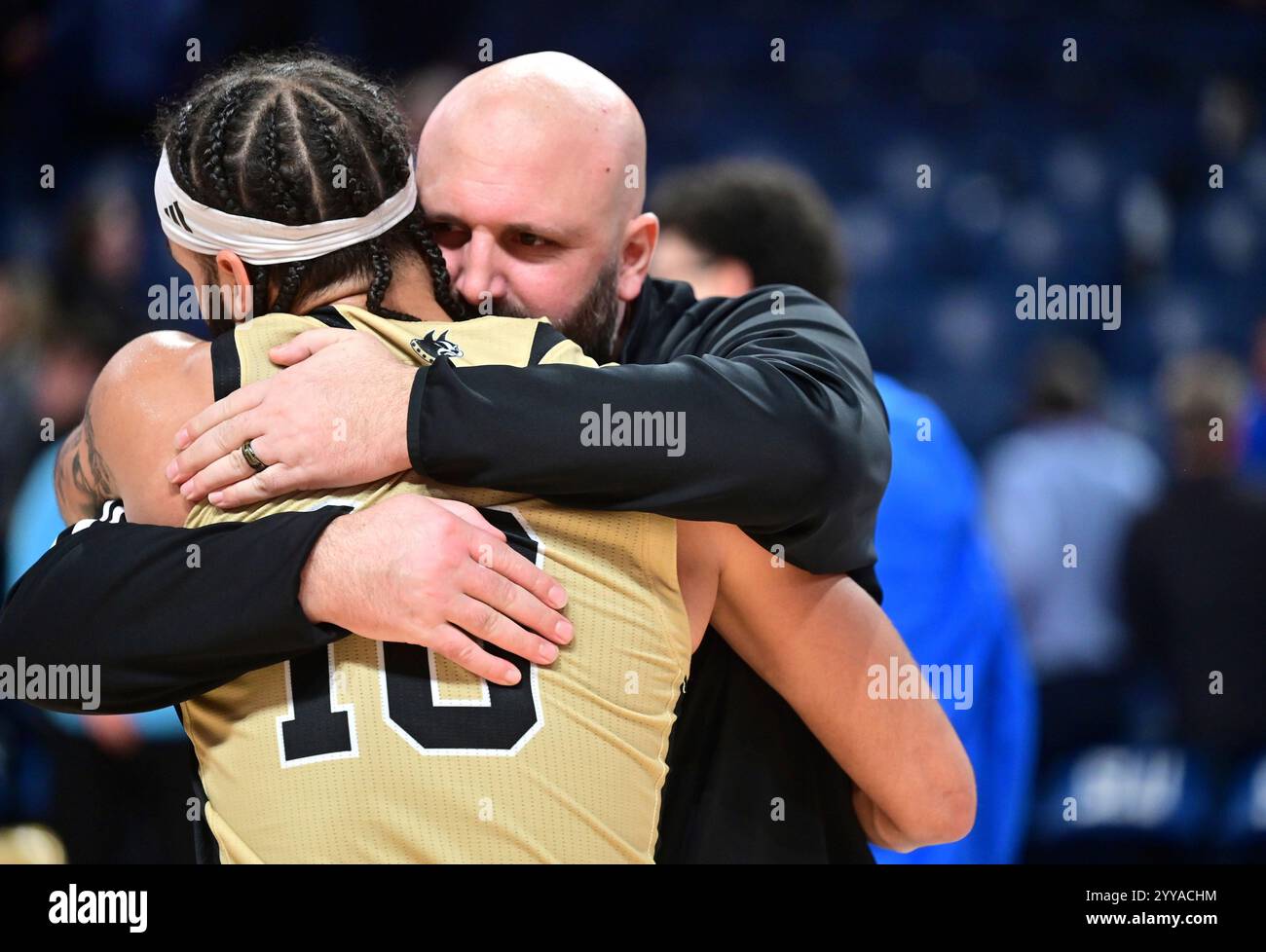 ST. LOUIS, MO - DECEMBER 18: Wofford head coach Dwight Perry hugs ...