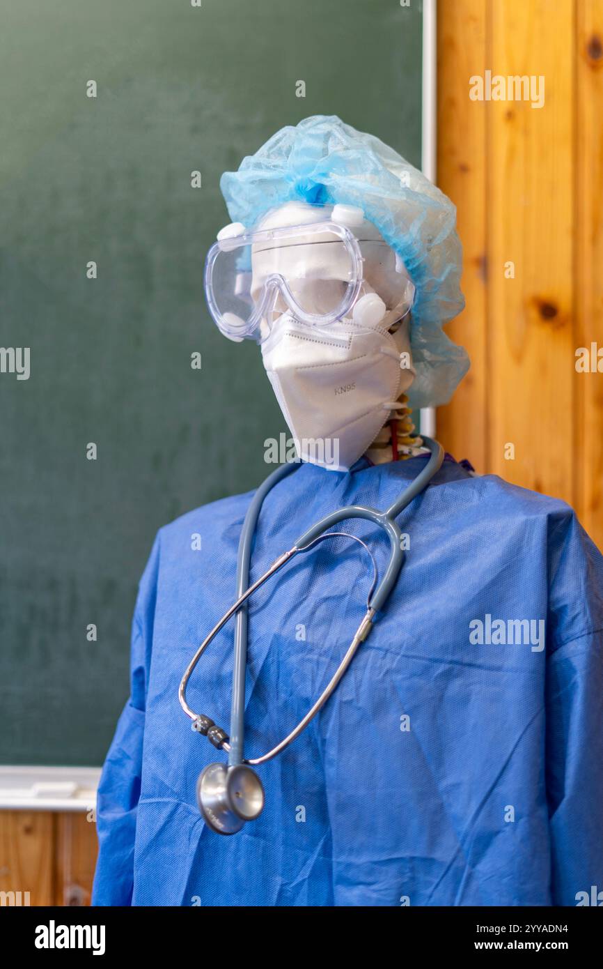 Demonstration skeleton dressed in medical protective equipment Stock ...