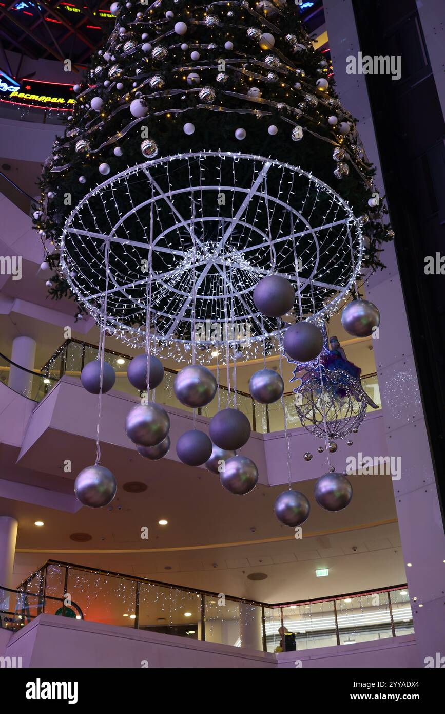 Experience the vibrant holiday decorations in the modern mall that ...