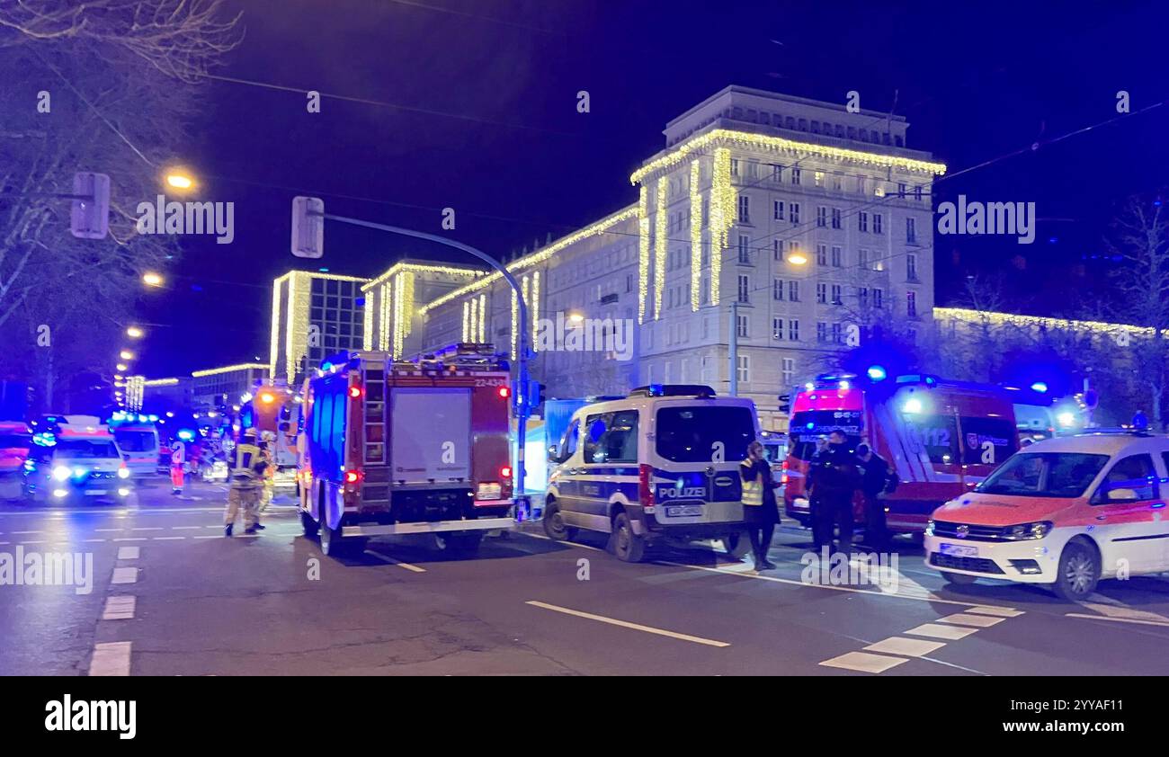 Magdeburg, Germany. 20th Dec, 2024. Emergency services, police and ...