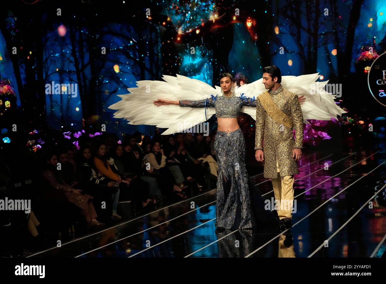 Models present creation from designer Parishae for Amir Adnan during a ...