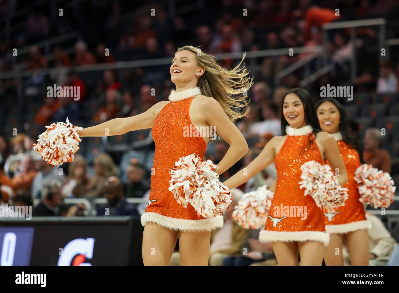 AUSTIN, TX - DECEMBER 19: Texas pom squad members perform in Christmas ...
