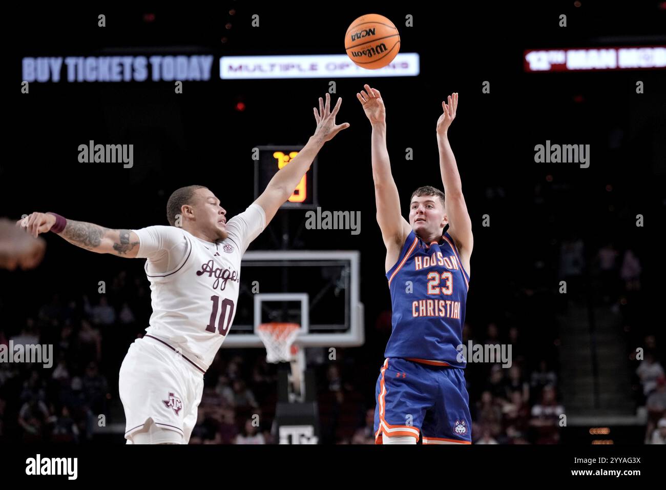 Houston Christian guard Pierce Bazil (23) shoots a three point basket ...