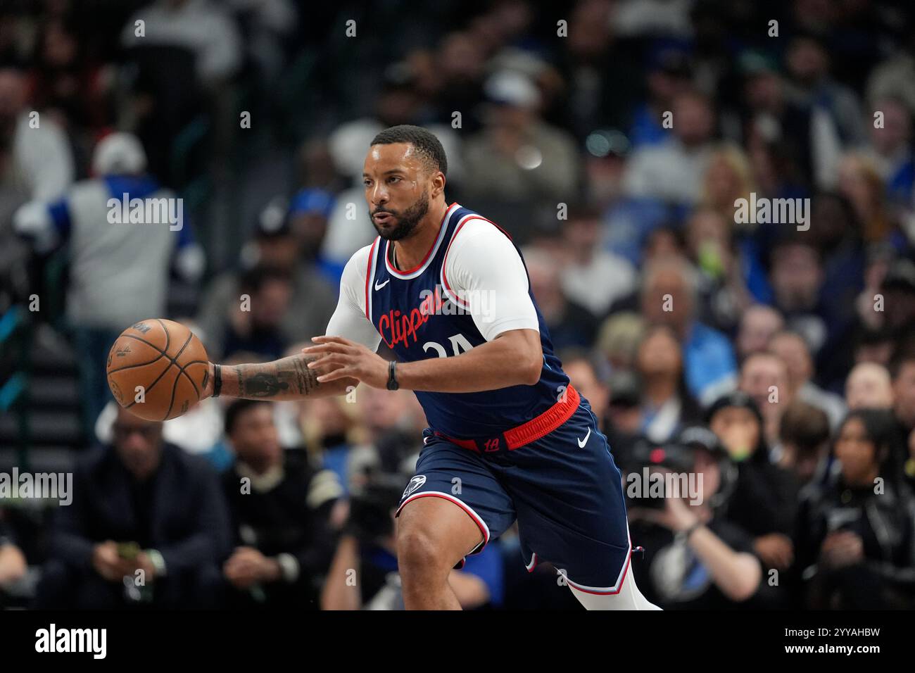 Los Angeles Clippers guard Norman Powell sprints upcourt during an NBA ...
