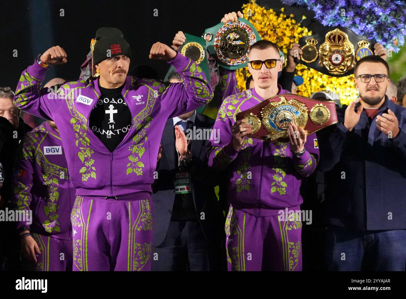 World Champion Ukraine's Oleksandr Usyk, left, arrives with his ...
