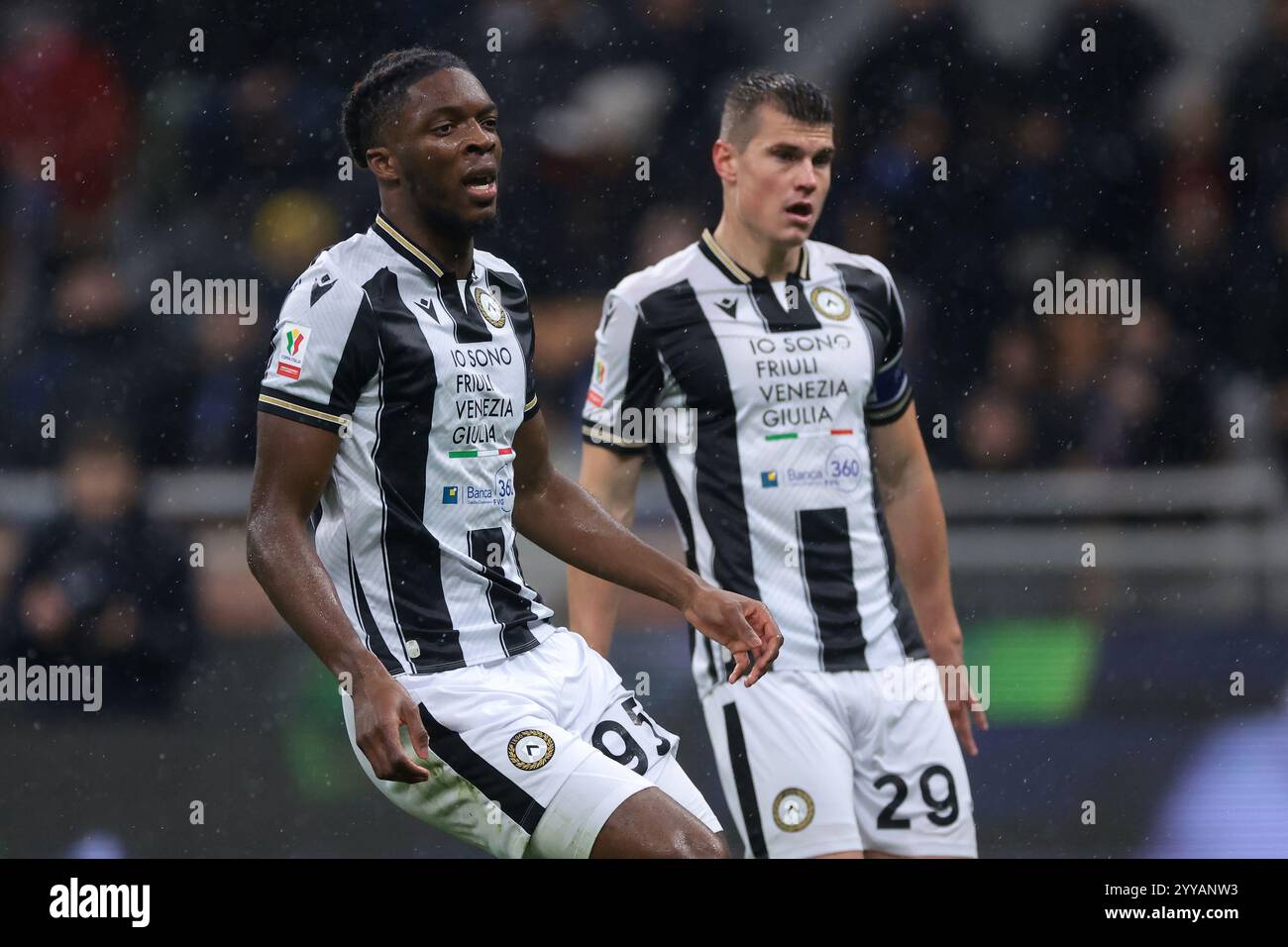 Milan, Italy. 19th Dec, 2024. Isaak Toure and Jaka Bijol of Udinese ...
