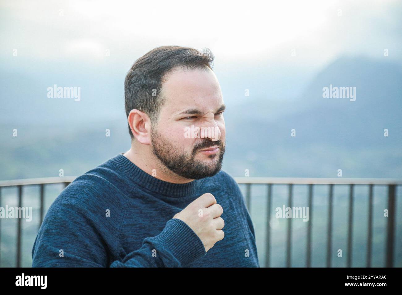 Disgusted Reaction from Tasting Bad Biscuit Stock Photo - Alamy