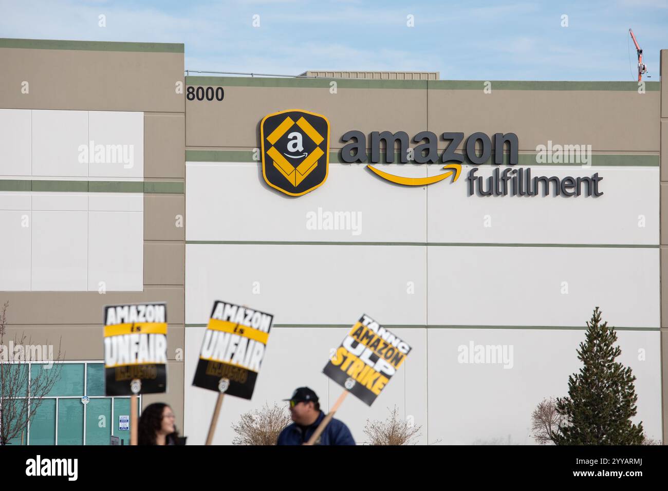 Workers strike outside of an Amazon building in Northern Reno, Nevada ...
