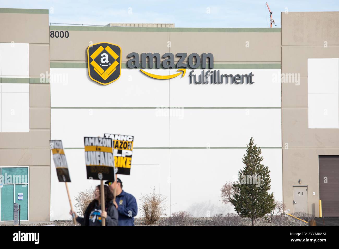 Workers strike outside of an Amazon building in Northern Reno, Nevada ...